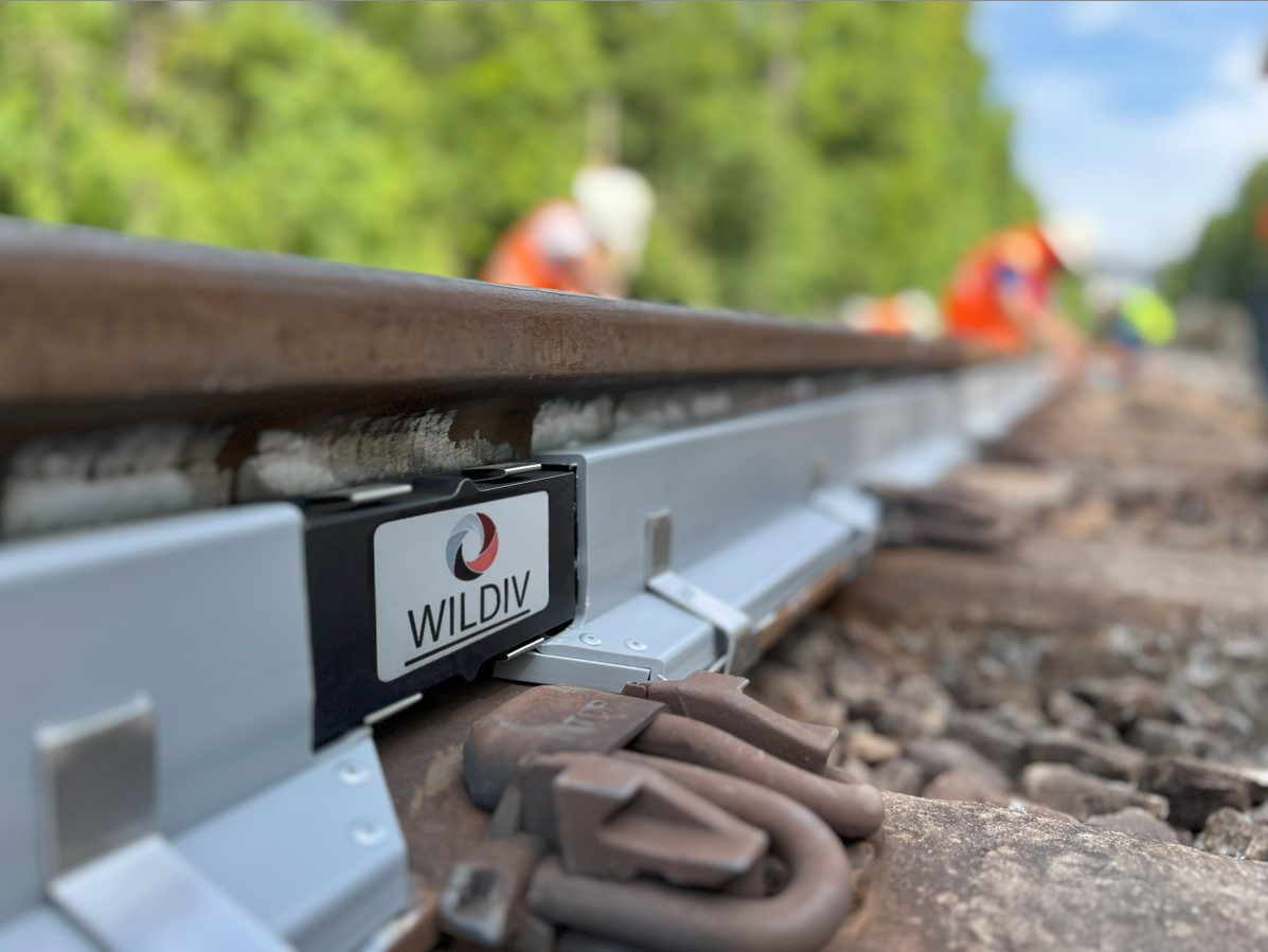 Engineered sub-ballast mats for ballast preservation and vibration ...